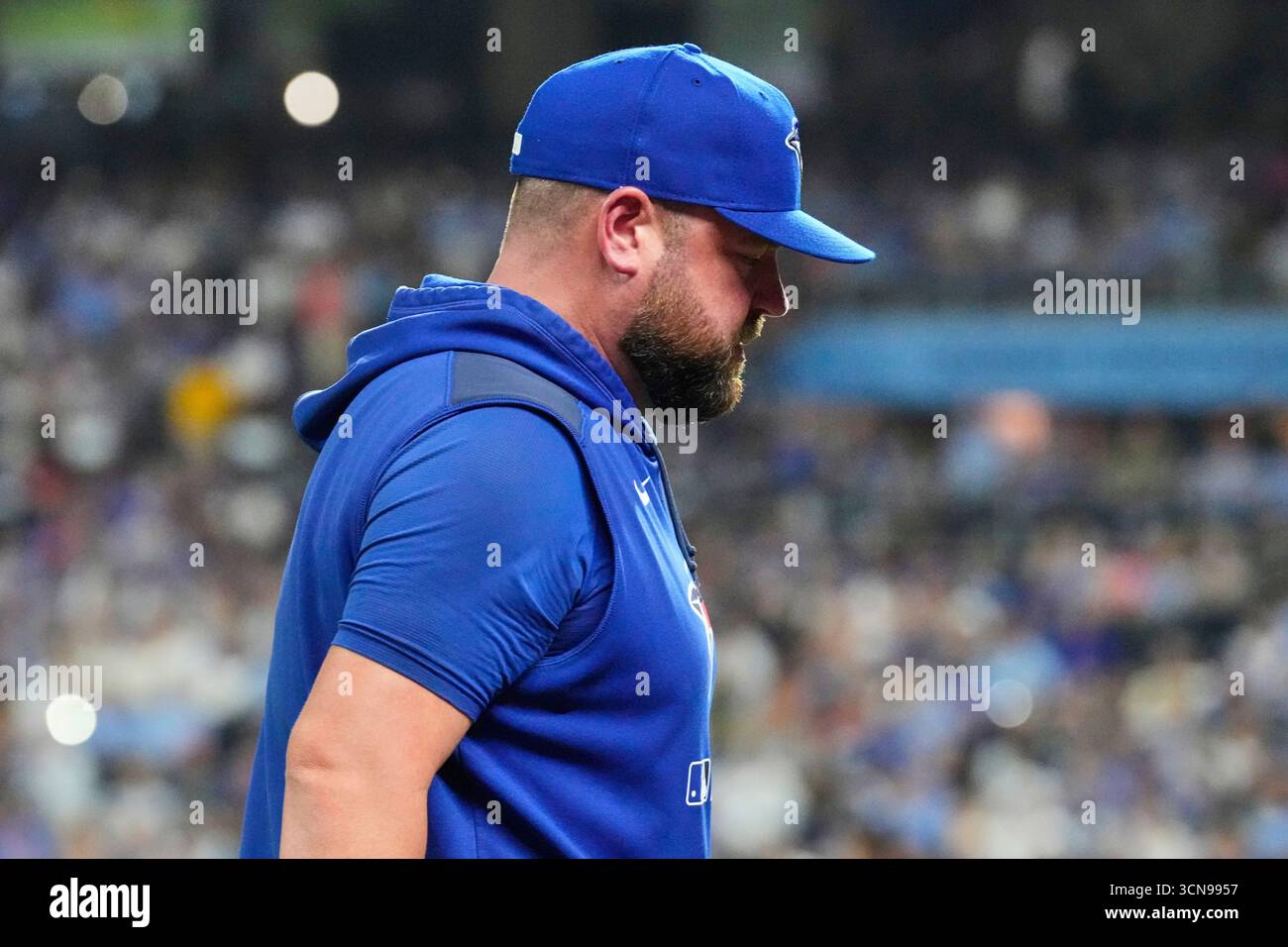 Toronto Blue Jays manager John Schneider walks to the dugout after getting ejected during the ...