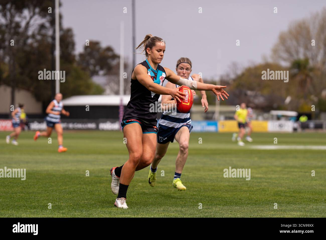 Sachi Syme (20 Port Adelaide) kicks the ball during the 2025 NAB AFLW ...