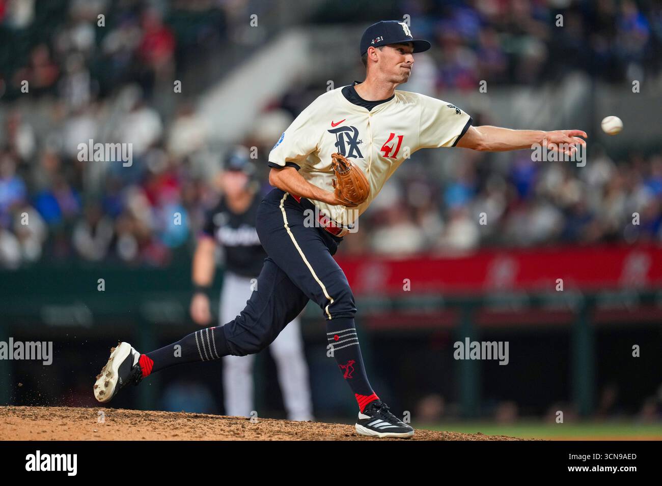 Texas Rangers pitcher Hoby Milner throws to the Miami Marlins during ...