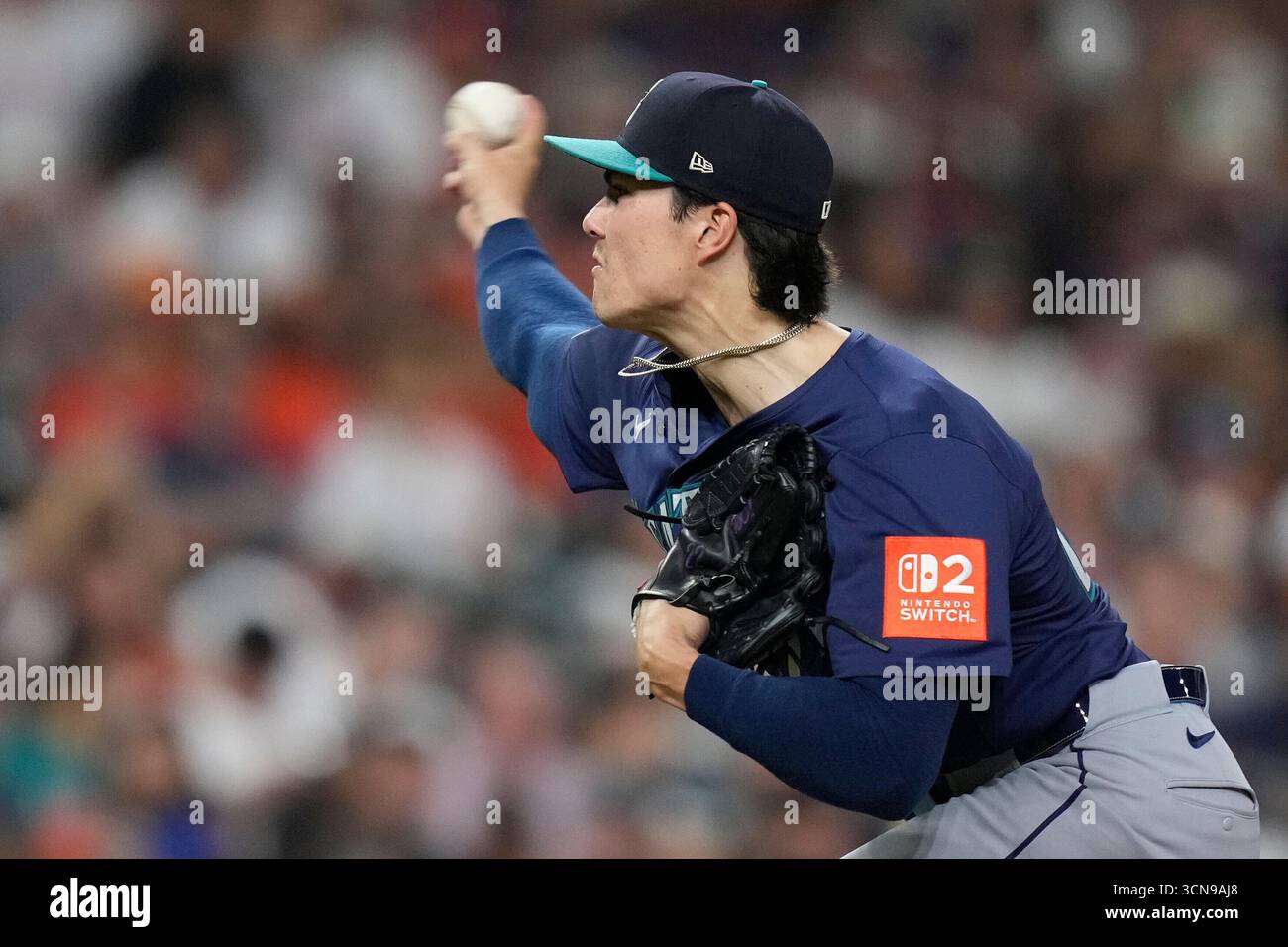 Seattle Mariners pitcher Bryan Woo (22) delivers during the fourth ...