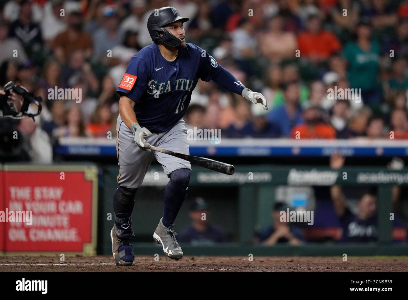 Seattle Mariners' Josh Naylor watches his solo home run during the ...