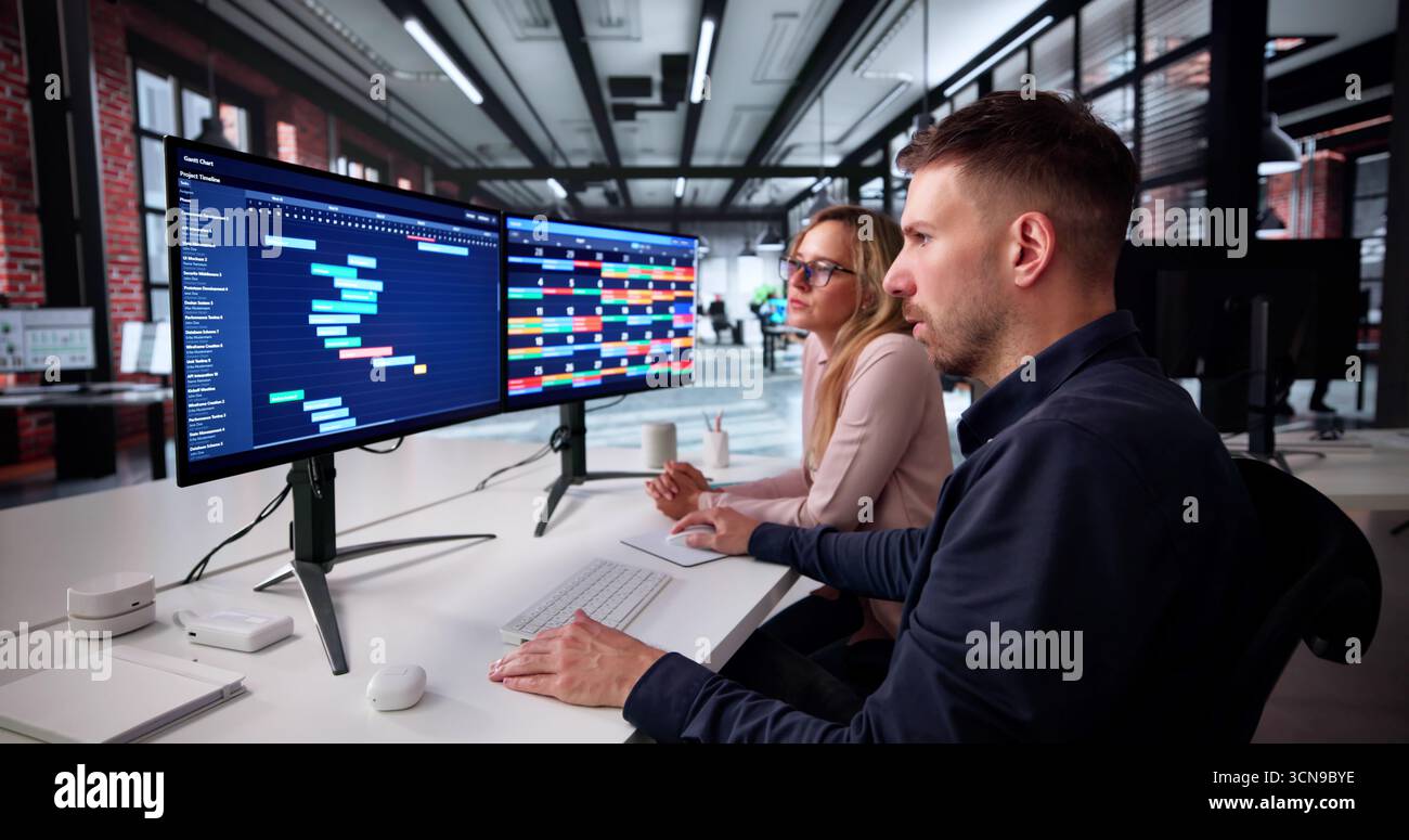Business Team Organizing Calendar For Project On Office Computer Screen ...