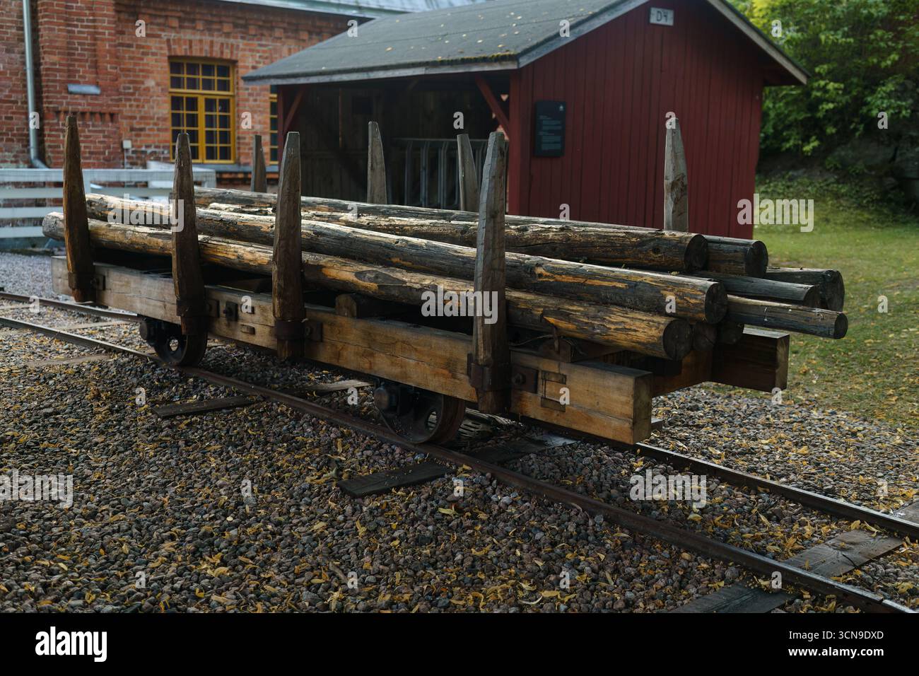 Historic wooden railroad cart loaded with logs outside the Verla Mill ...
