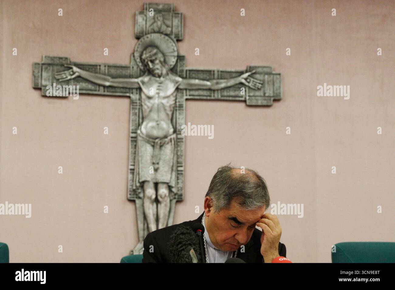FILE — Cardinal Angelo Becciu talks to journalists during news ...