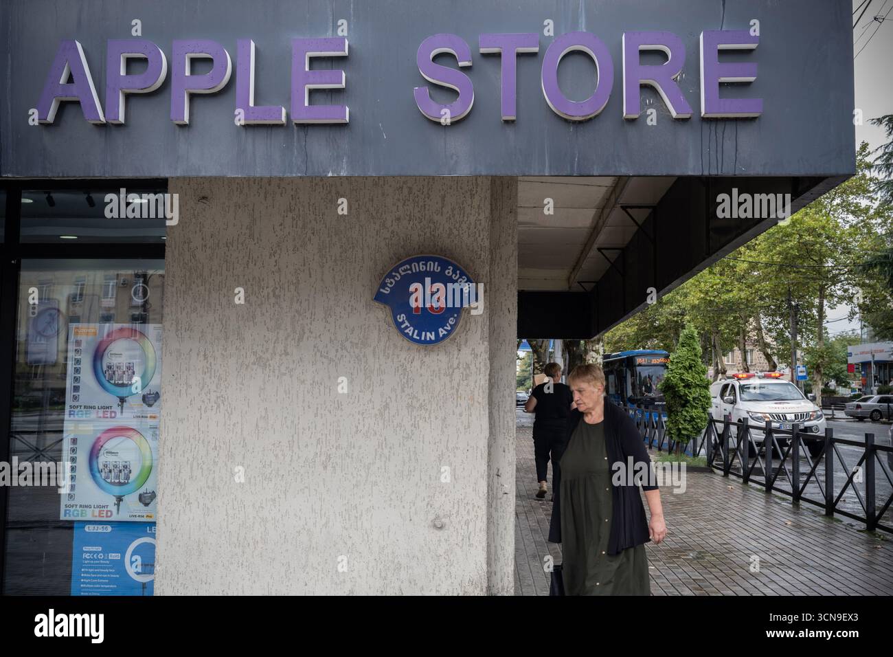 Steet sign for Stalin Avenue outside an unofficial Apple Store ...