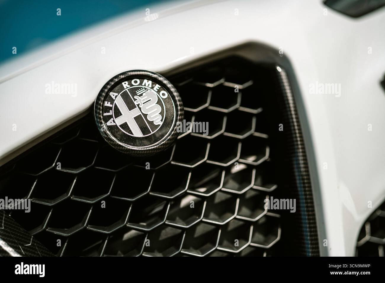 Milan, italy 20 september 2025: alfa romeo logo displayed on the front ...