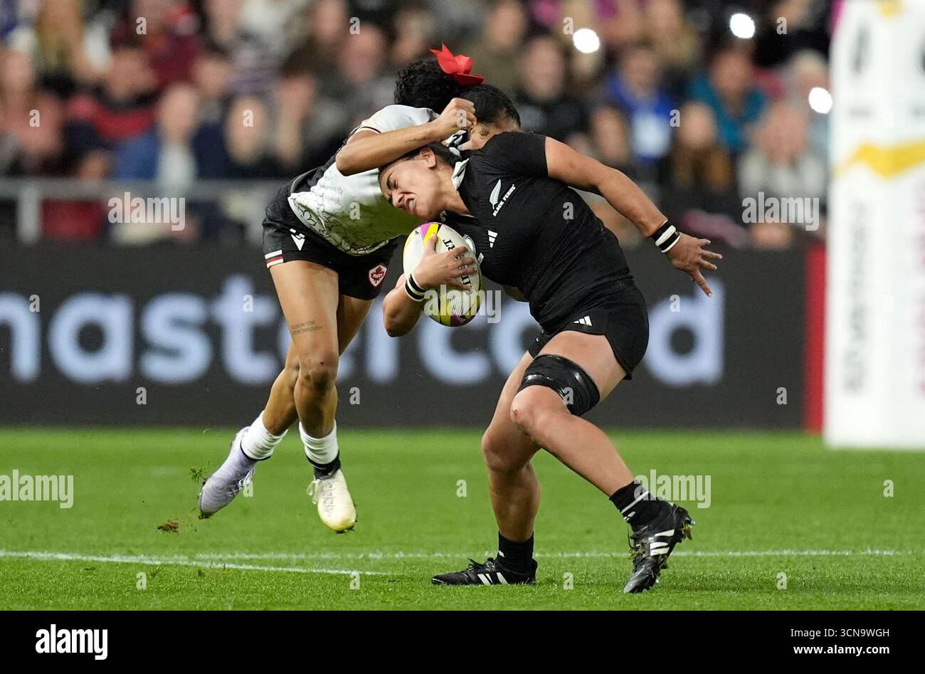 New Zealand’s Stacey Waaka (right) is tackled by Canada’s Asia Hogan ...