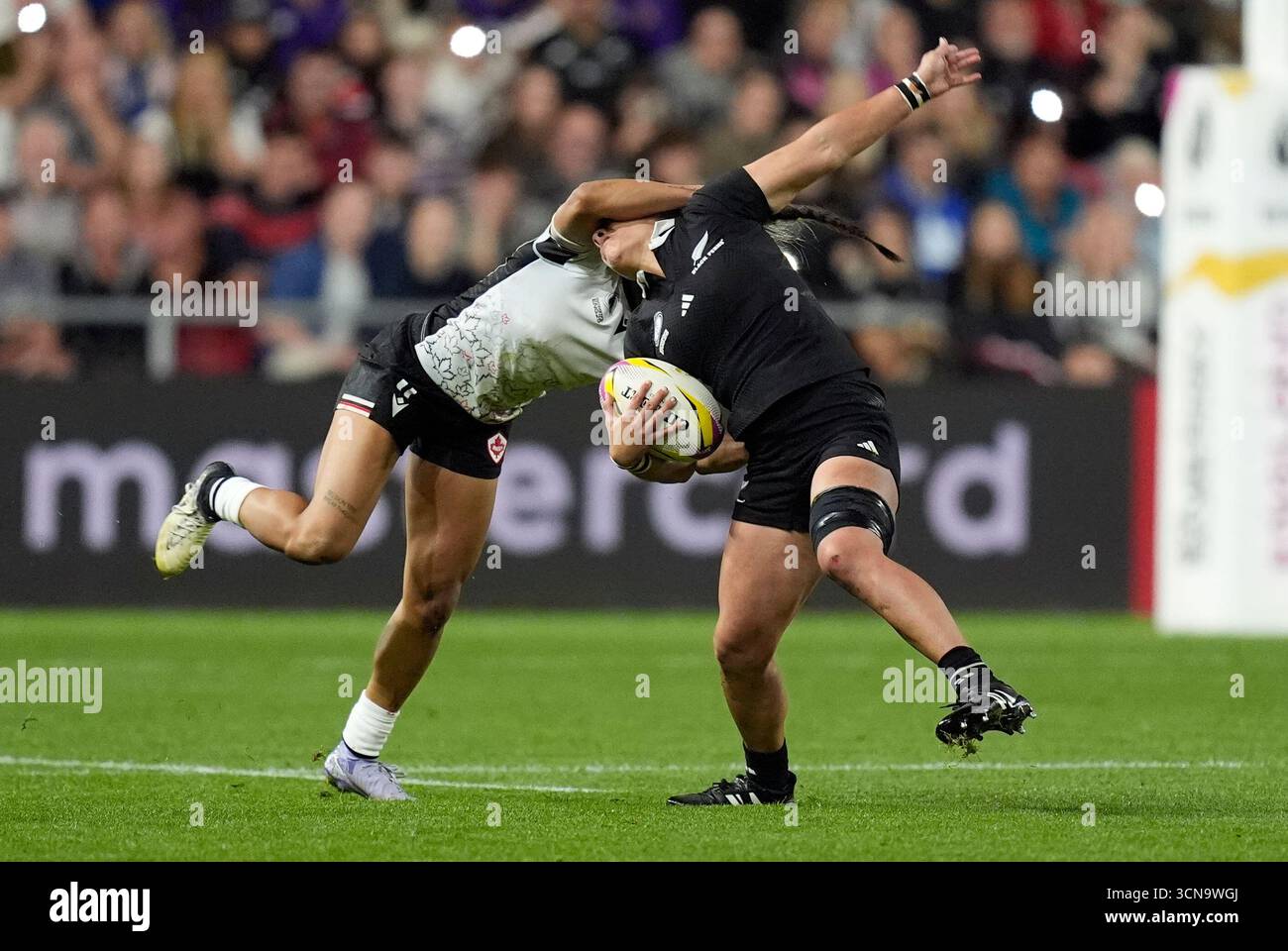 New Zealand’s Stacey Waaka (right) is tackled by Canada’s Asia Hogan ...