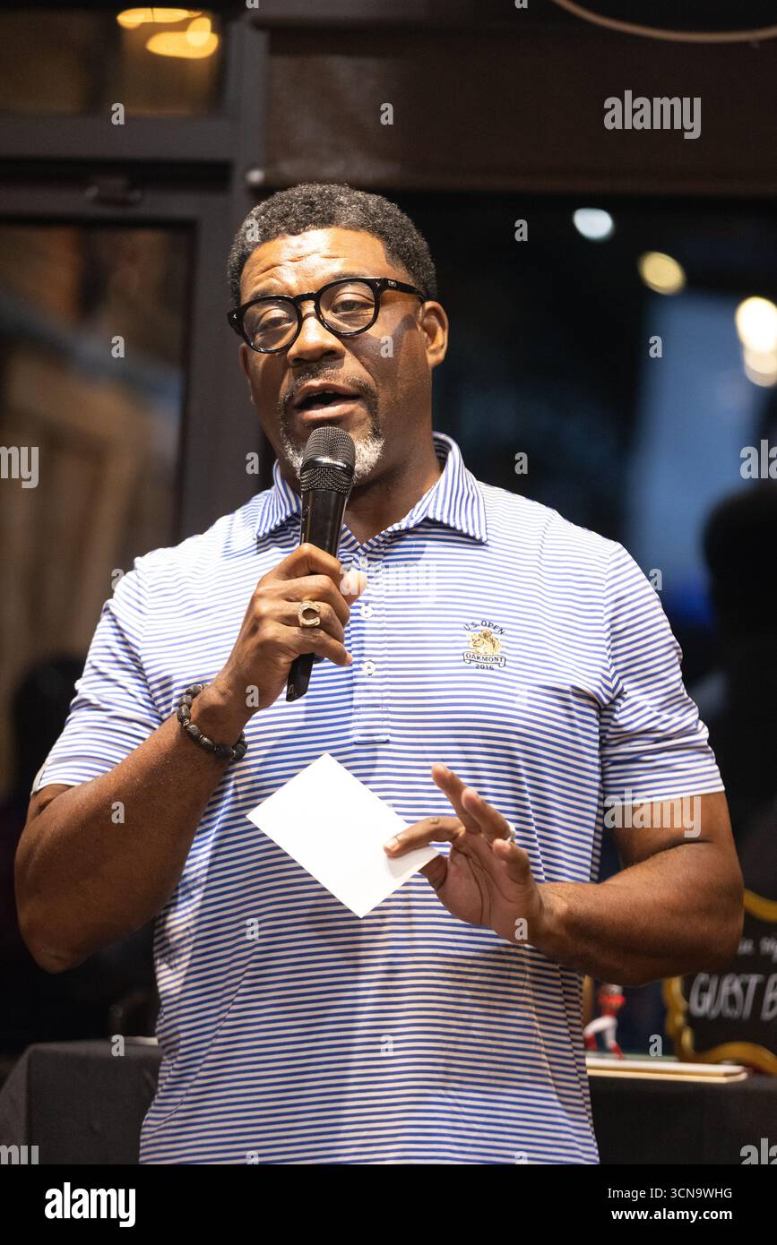 Pastor Michael McDaniel speaks at Coach’s Corner Norman to honor former ...