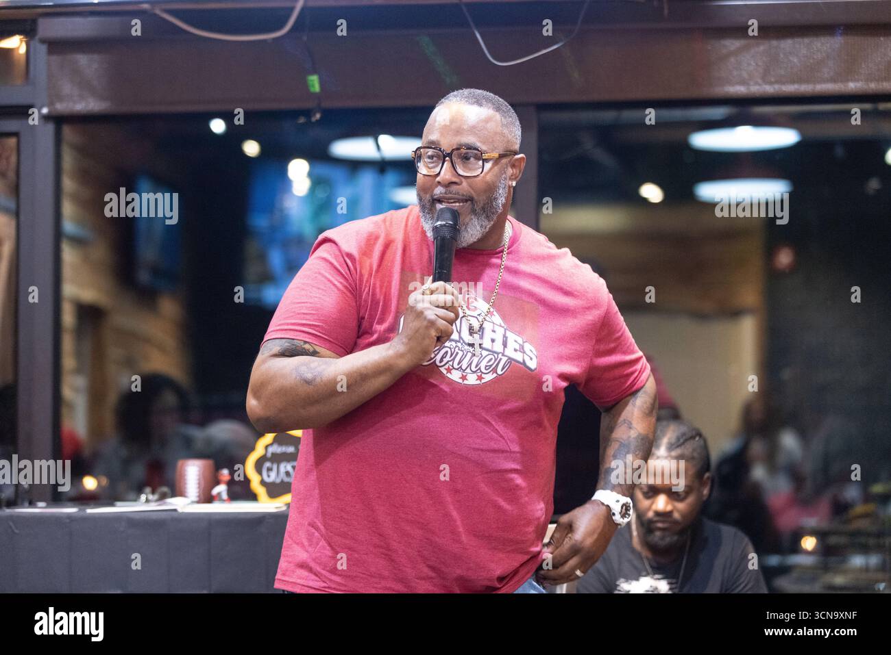 Former Oklahoma Sooner player Corey Wilson speaks at Coach’s Corner ...