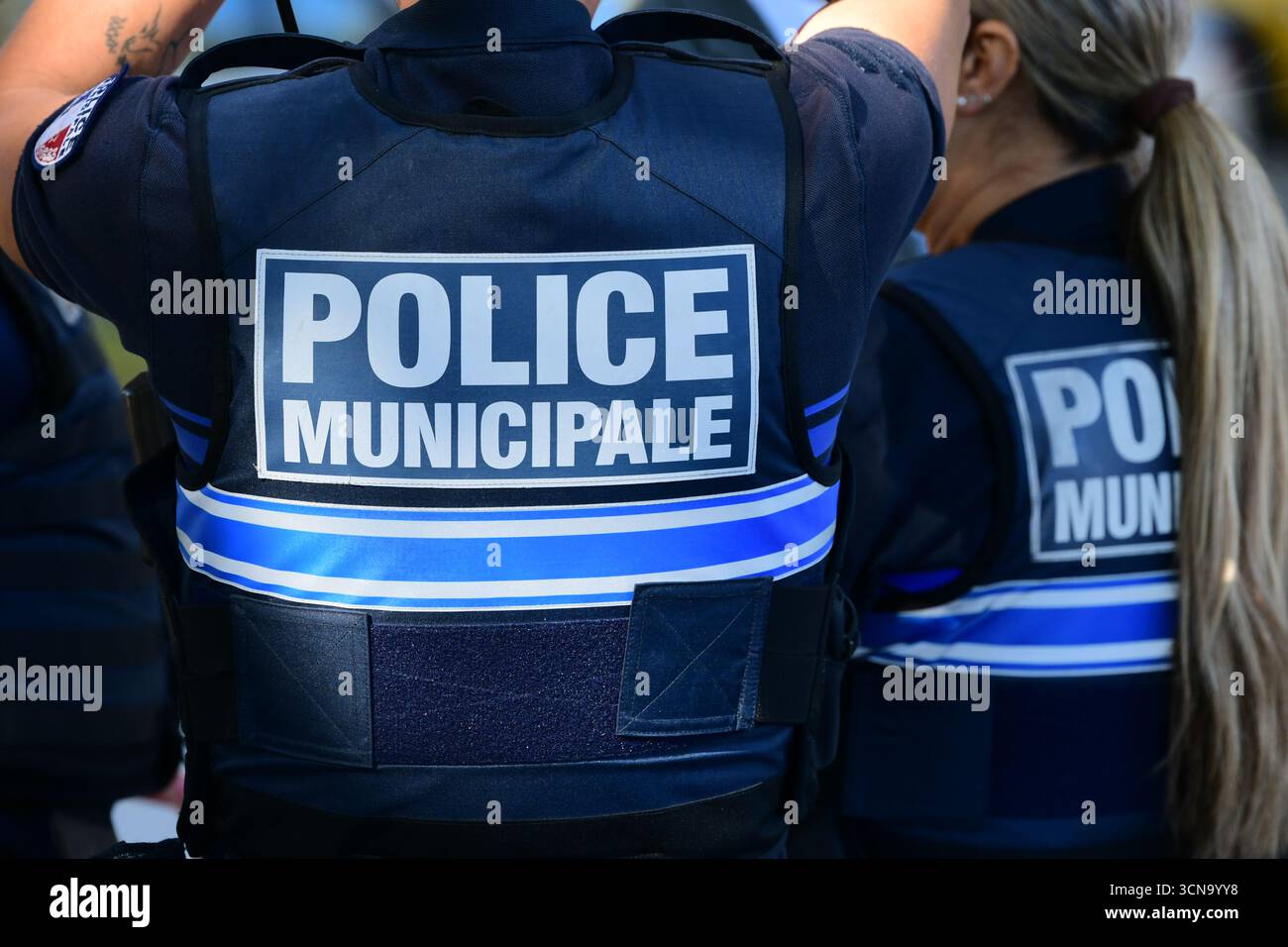 A municipal police officer provides security at the Saint-Étienne fair ...