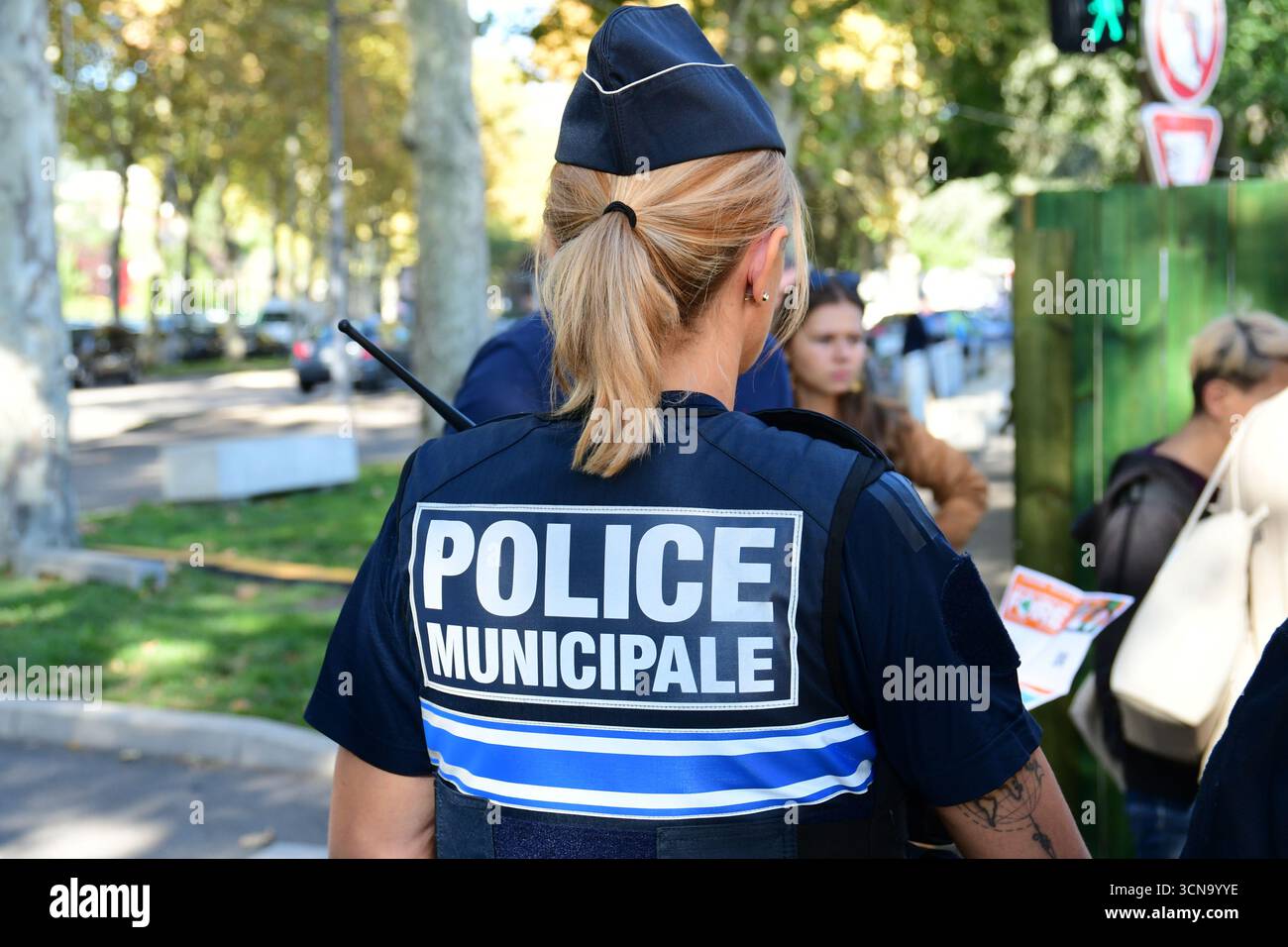 A municipal police officer provides security at the Saint-Étienne fair ...