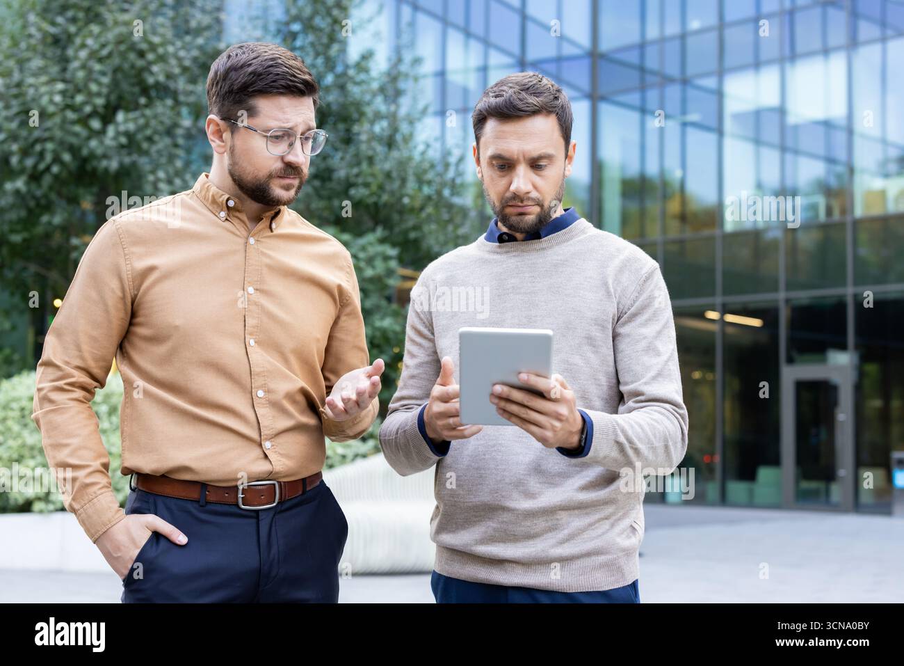 Two tech colleagues reviewing hi-res stock photography and images - Alamy