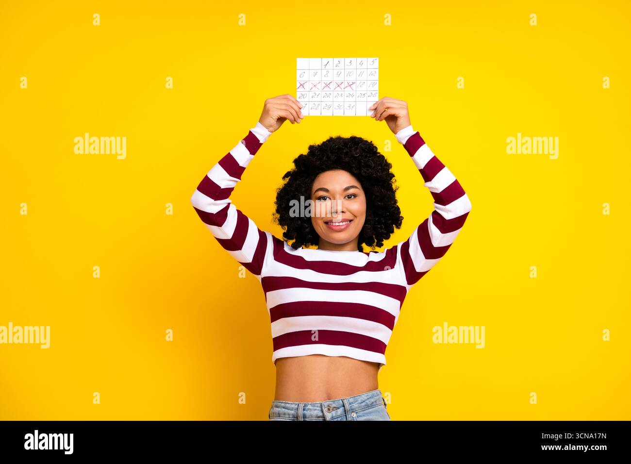 Woman showing calendar marked hi-res stock photography and images - Alamy