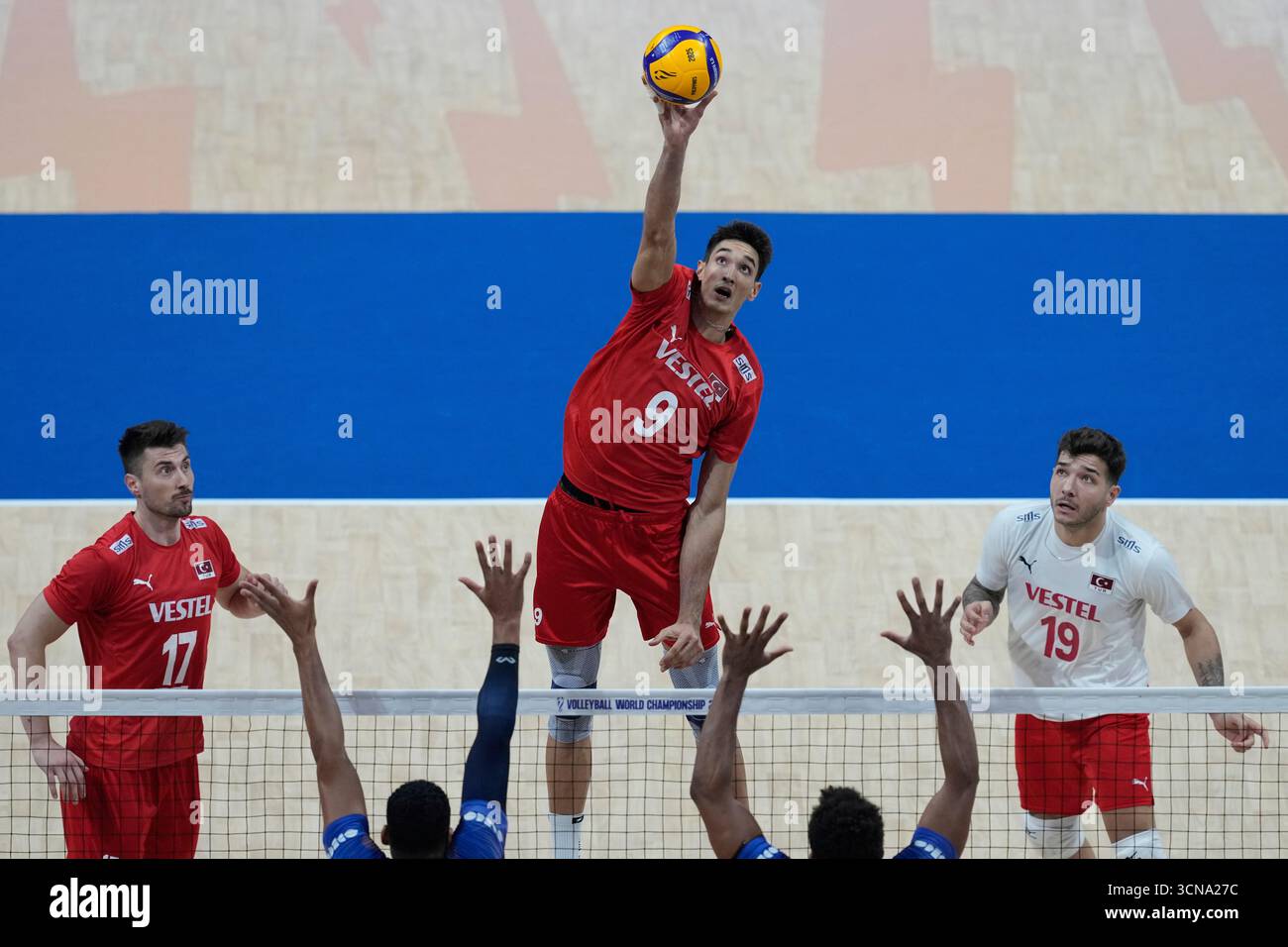 Ramazan Efe Mandiraci of Turkey spikes the ball against Netherlands ...
