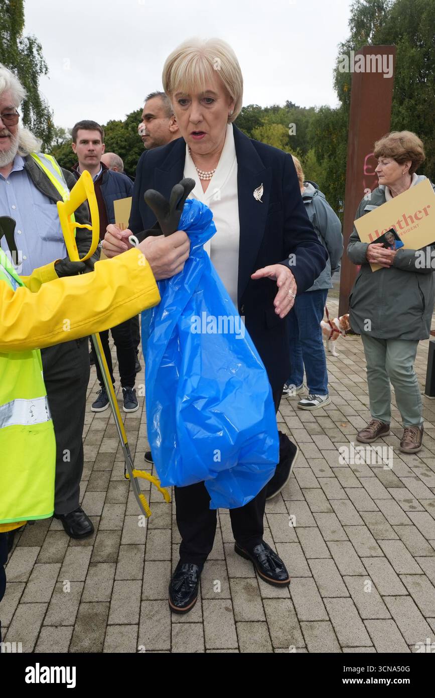 Fine Gael presidential candidate Heather Humphreys is passed a litter ...