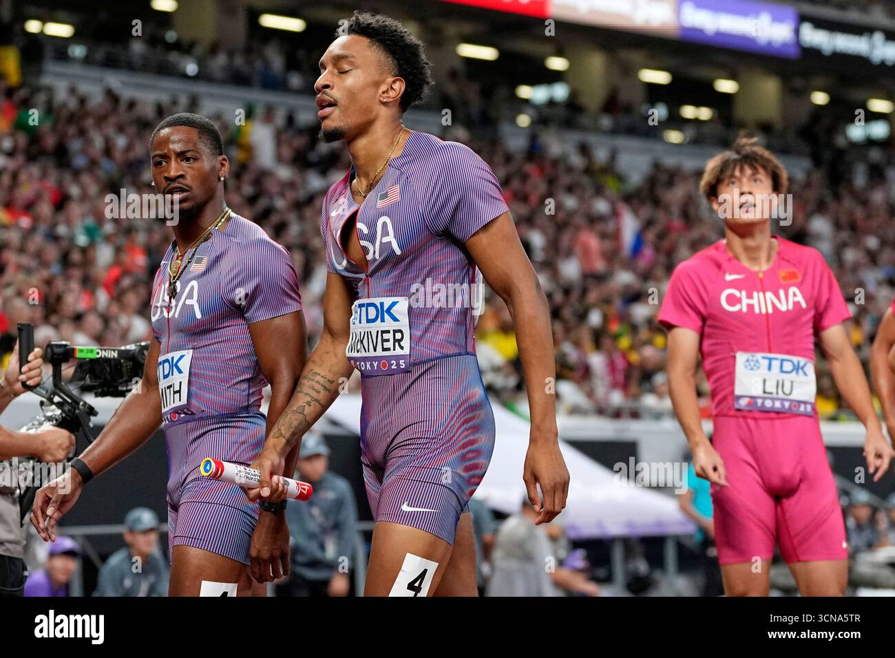 United States' Jenoah McKiver and United States' Demarius Smith walk ...