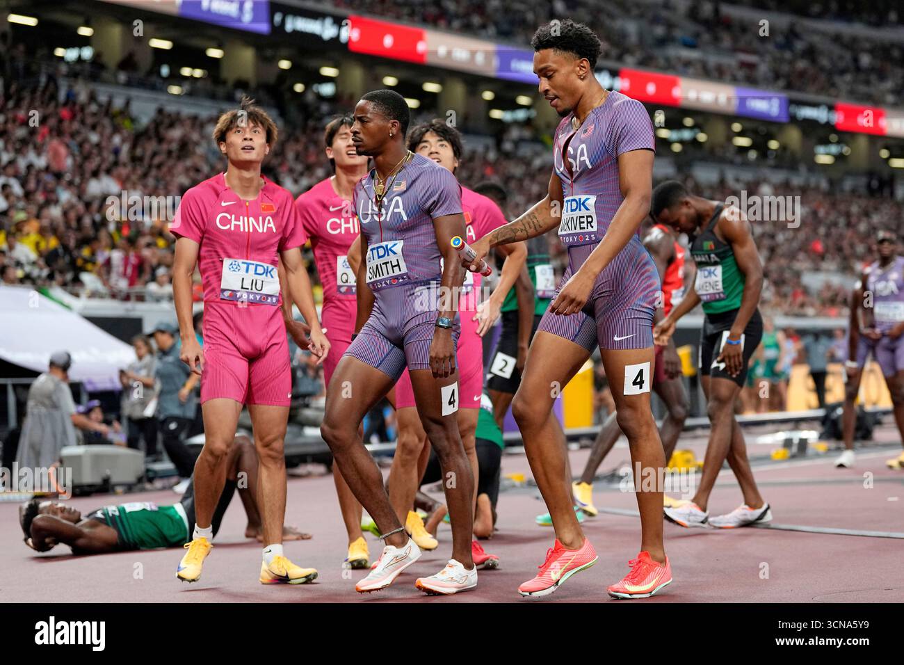 United States' Jenoah McKiver and United States' Demarius Smith walk ...