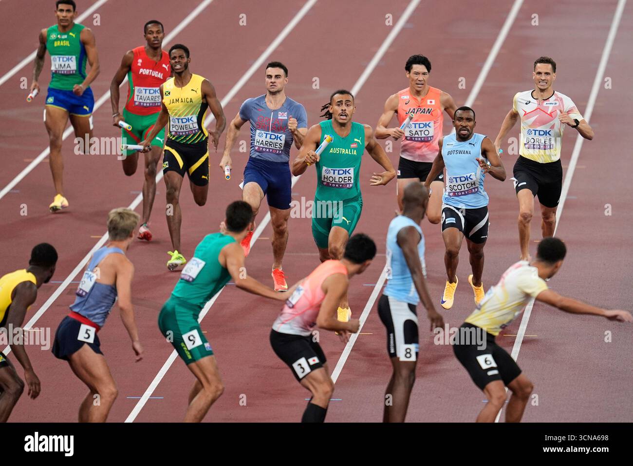 Australia's Reece Holder, center, tries to give the baton to Connor ...