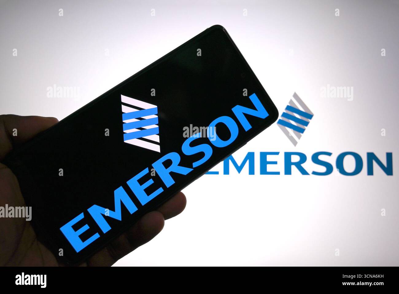 In this photo illustration, an Emerson logo is seen displayed on a ...