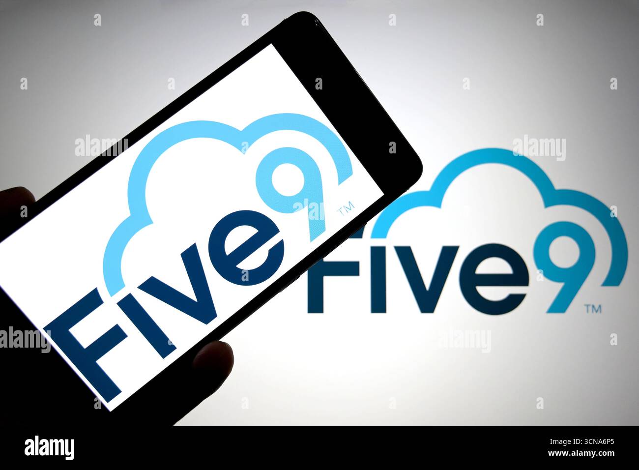 In this photo illustration, a five9 logo is seen displayed on a ...