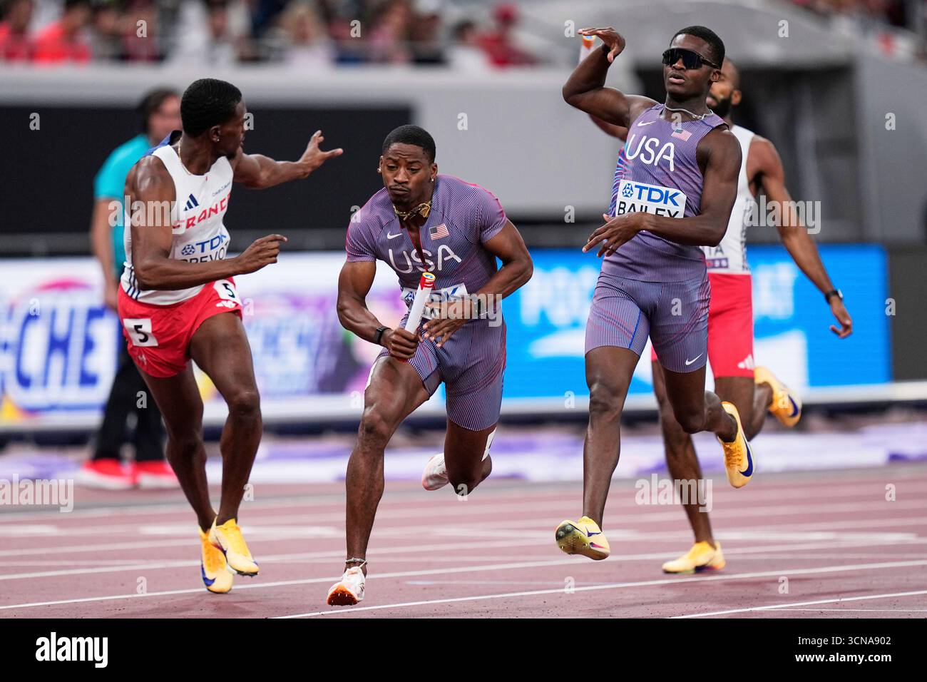 United States' Christopher Bailey hands off to Demarius Smith during a ...