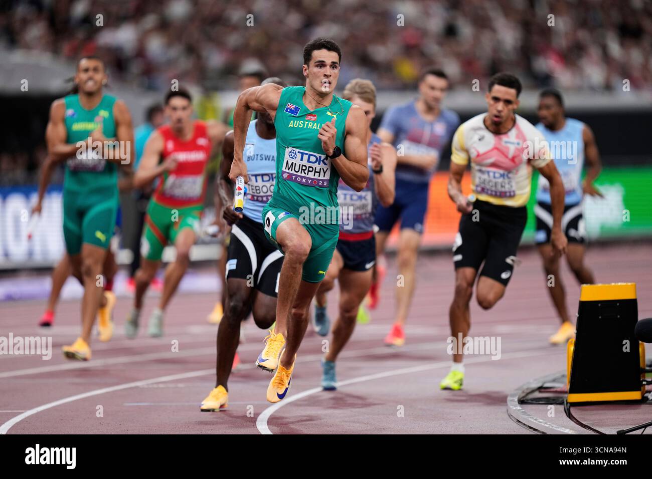Australia's Aidan Murphy competes in a men's 4 X 400 meters relay heat ...
