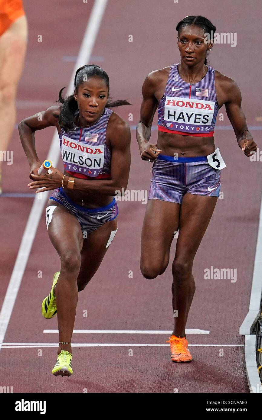 United States' Britton Wilson receives the baton from Quanera Hayes in ...