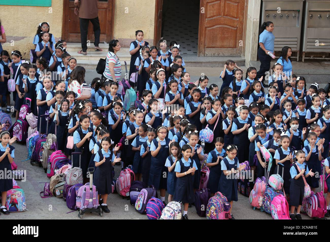 New school year starts in Egypt Students attend a morning assembly on ...