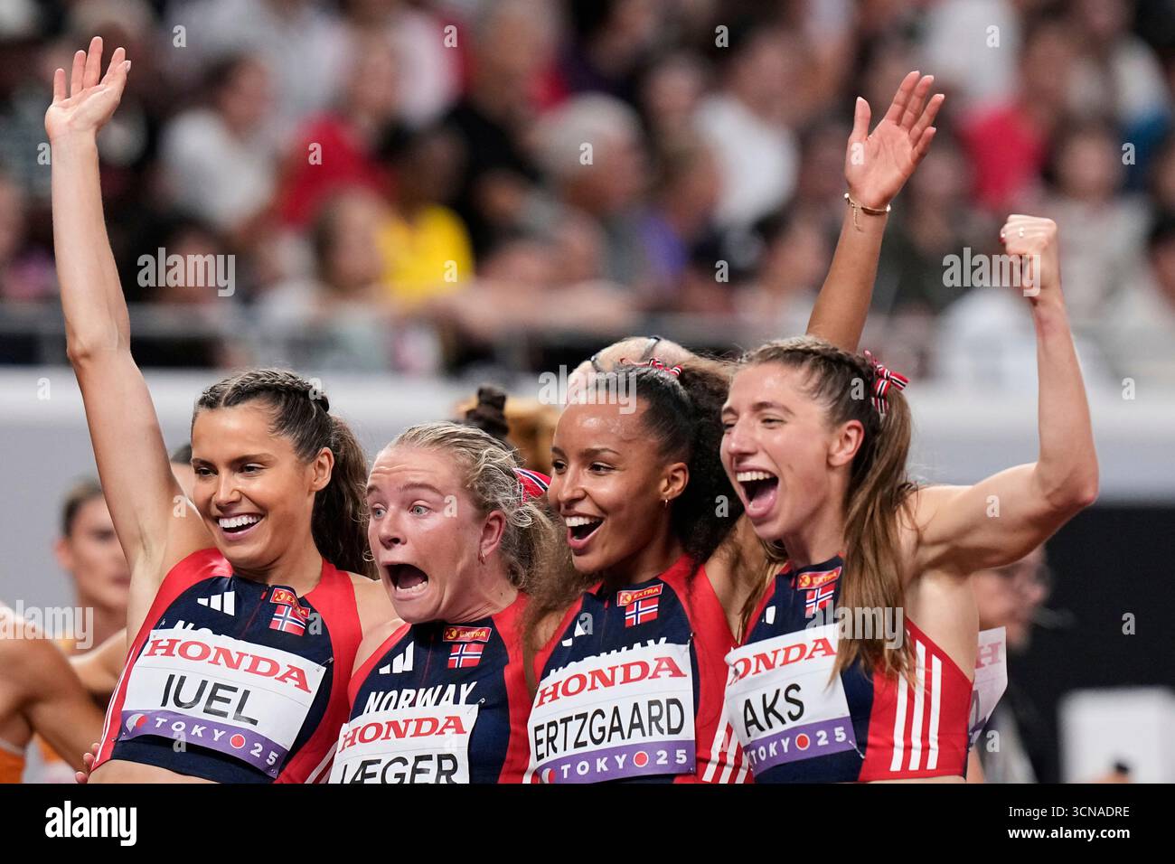 Team Norway celebrates after a a women's 4 X 400 meters relay heat at ...