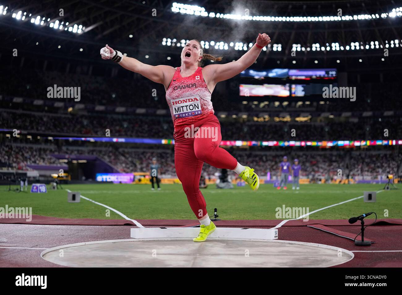 Canada's Sarah Mitton makes an attempt in the women's shot put final at ...