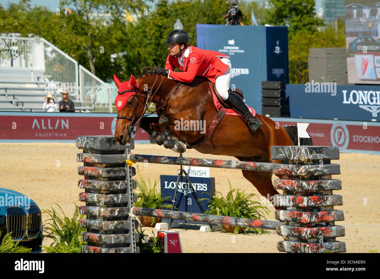 Neal Fearon, horse Derryglen Obsidian compete during the Longines ...