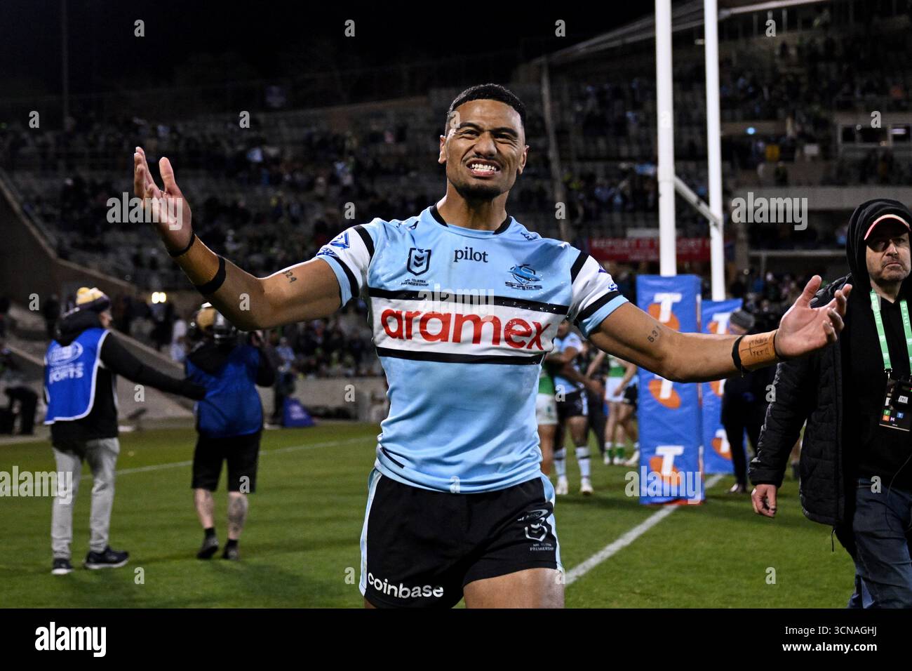 Ronaldo Mulitalo of the Sharks gestures to supporters following his ...
