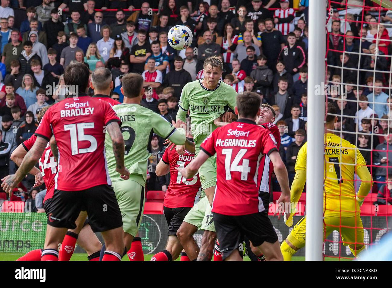 Mads Anderson (5) of Luton Town heads across goal during the Sky Bet ...