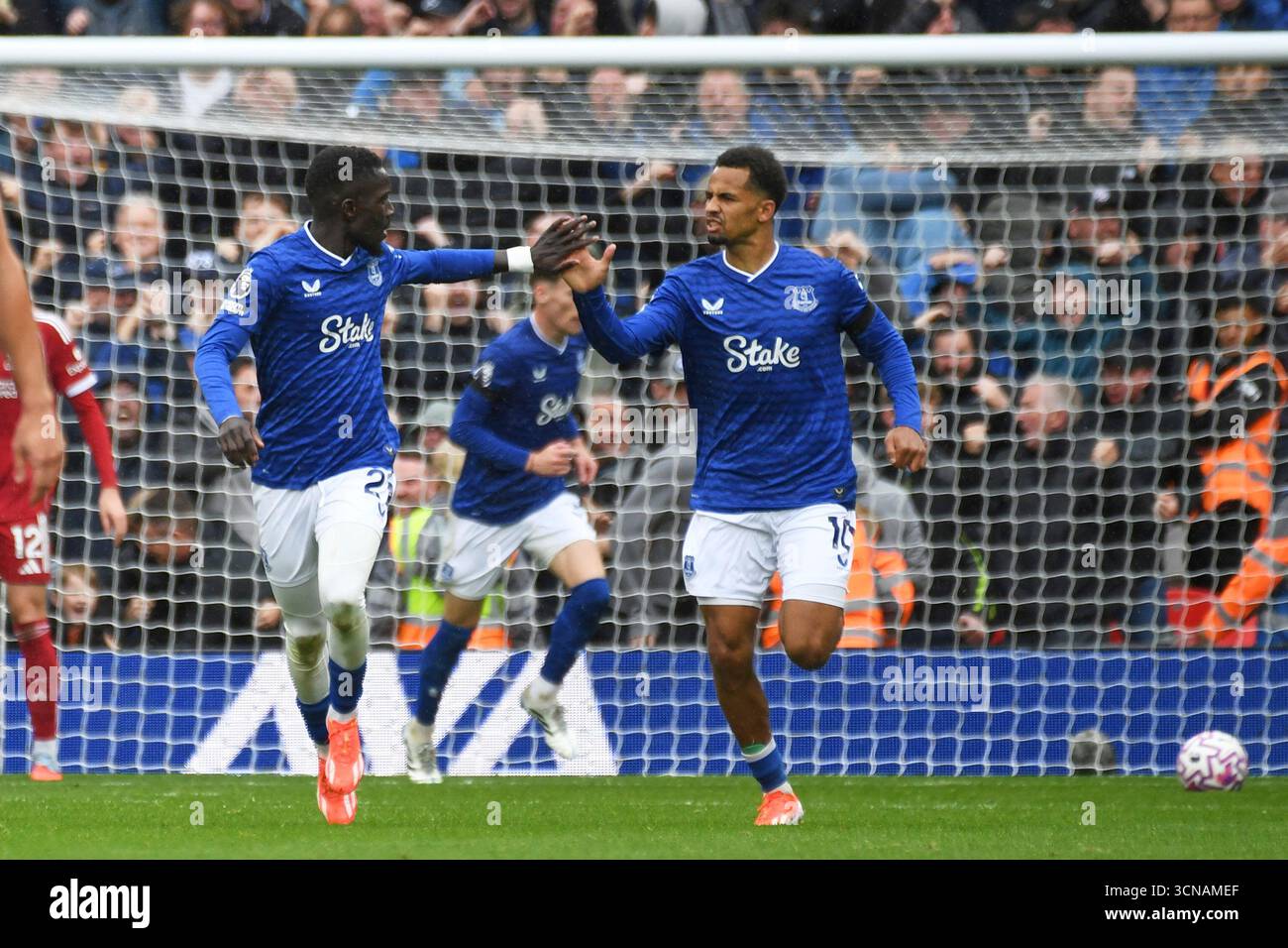 Everton's Idrissa Gueye, left, celebrates with Everton's Iliman Ndiaye ...