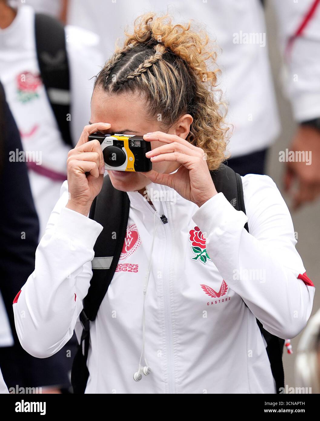 England's Ellie Kildunne using a camera as she arrives ahead of the ...