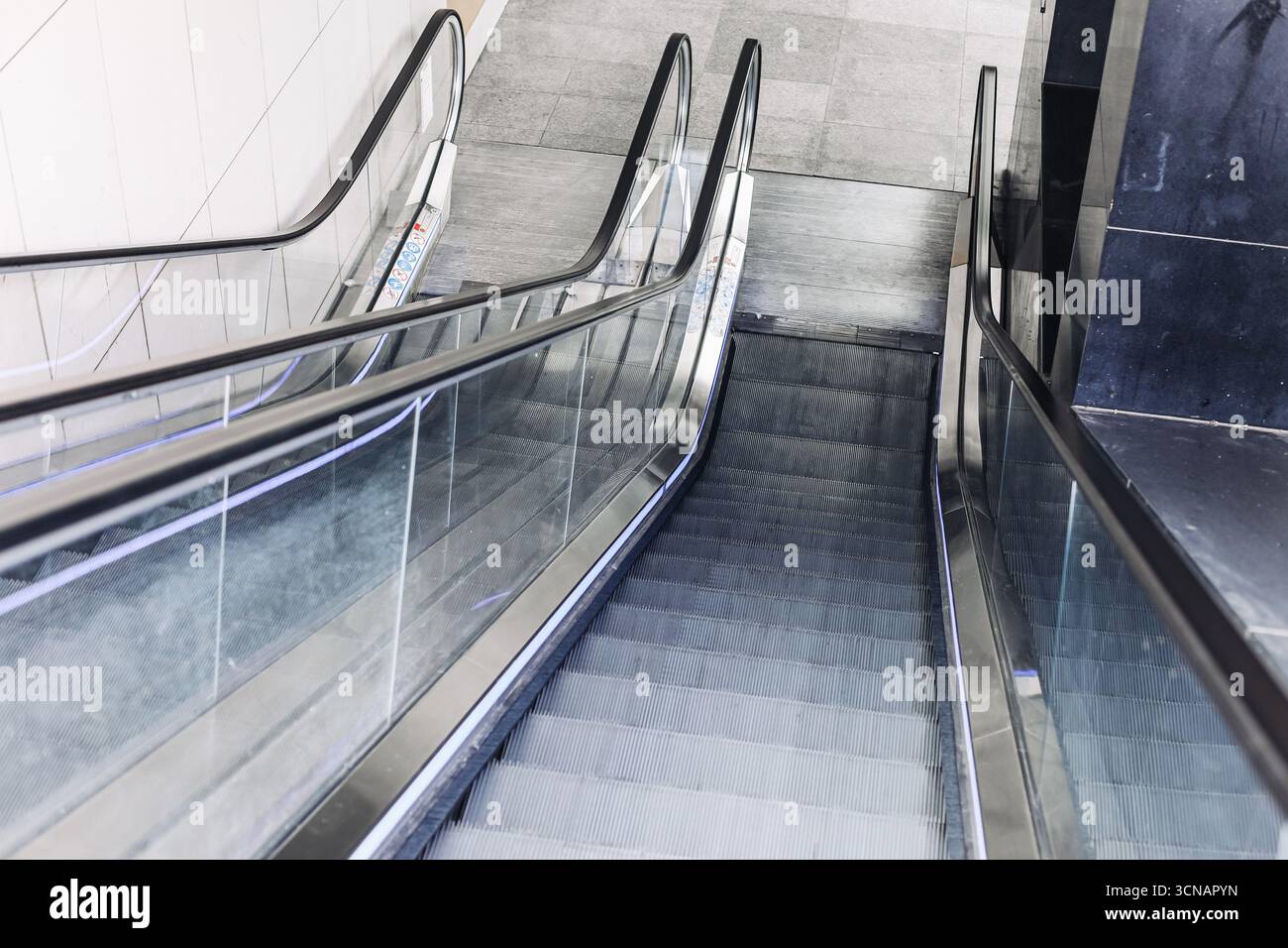 Escalator indoors. Modern moving staircase in shopping mall. Urban ...