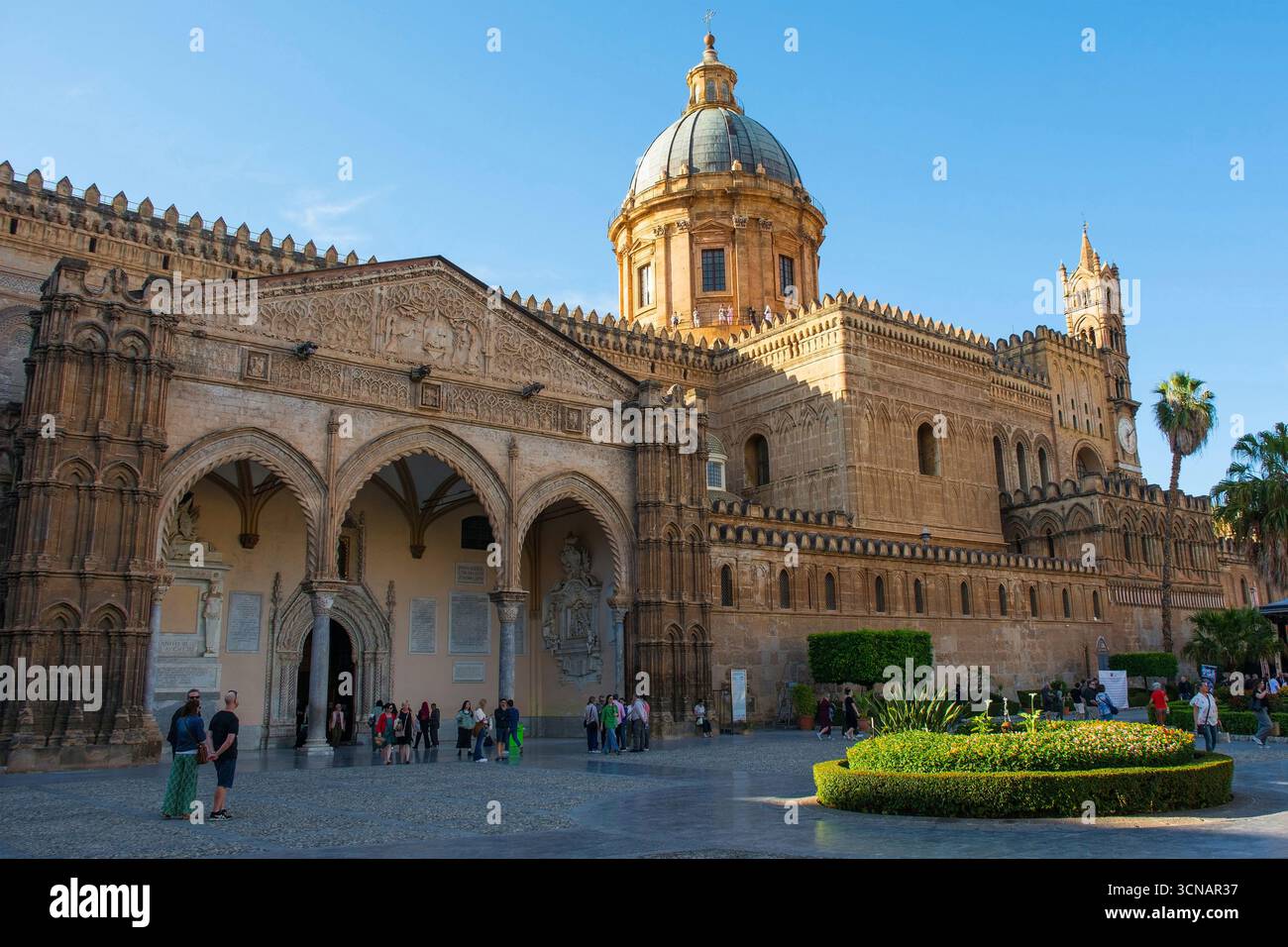 Palermo, Italy - May 16 2025. Tourists milling around in the gardens of ...
