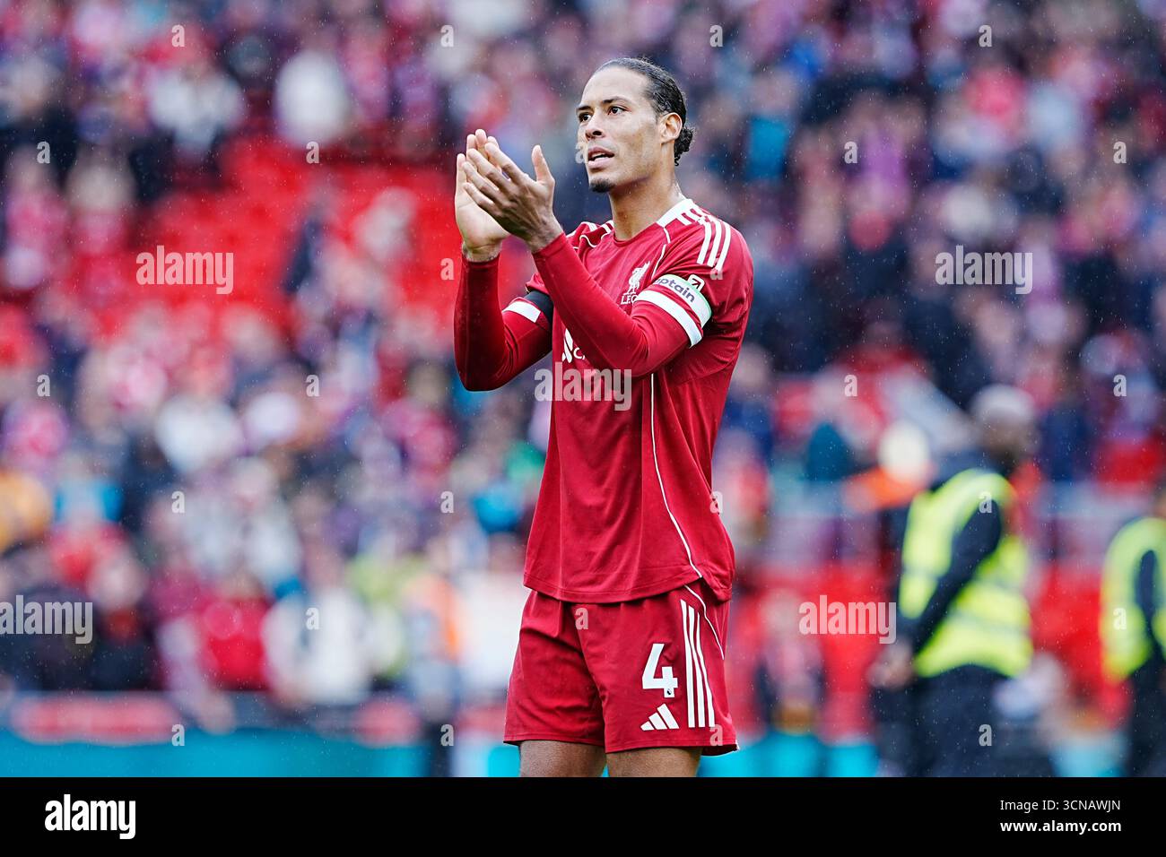 Liverpool's Virgil van Dijk acknowledges the fans following victory in ...