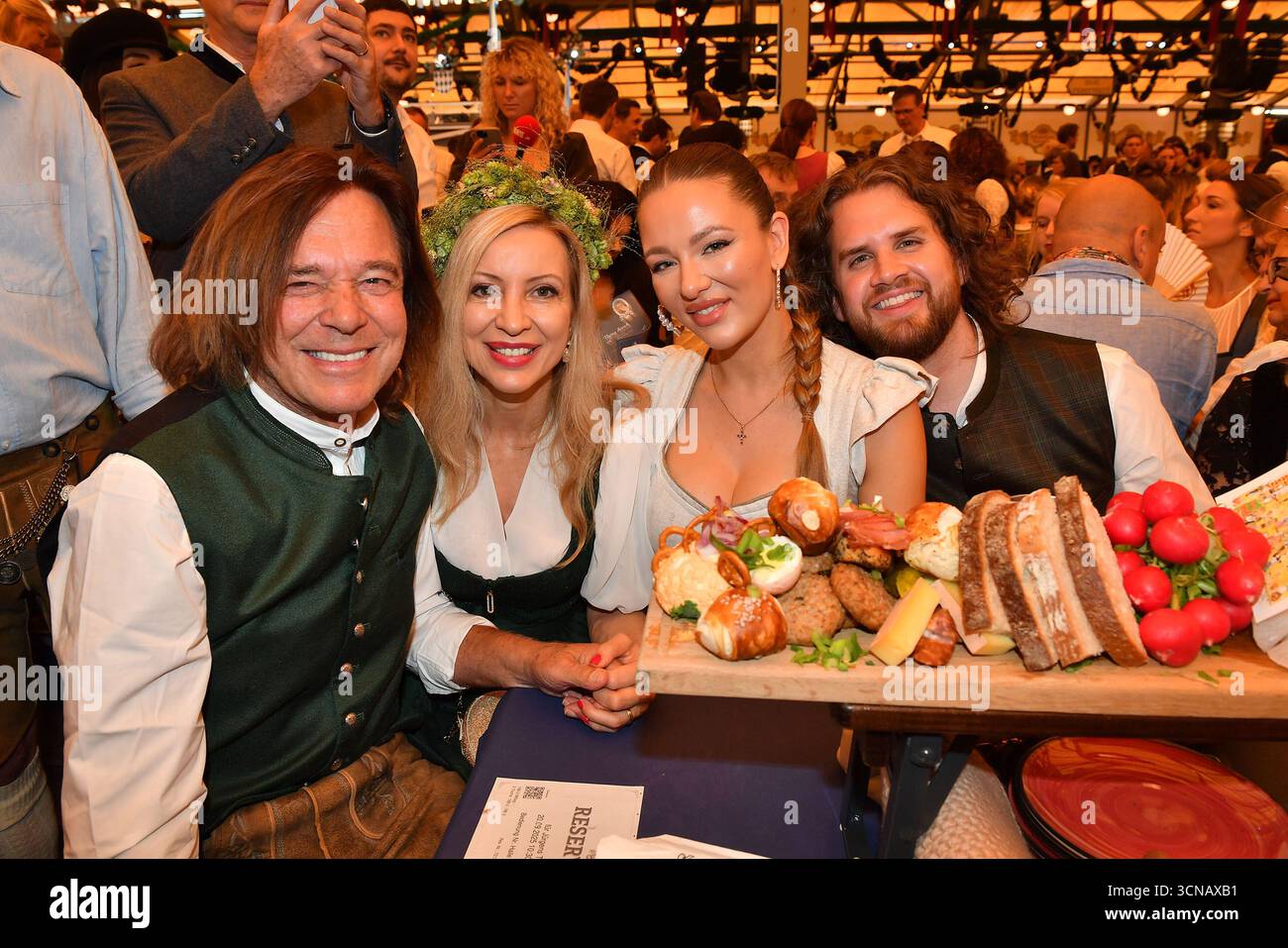 Juergen Drews, Ramona Drews, Joelina Drews and Adrian Louis pose during ...