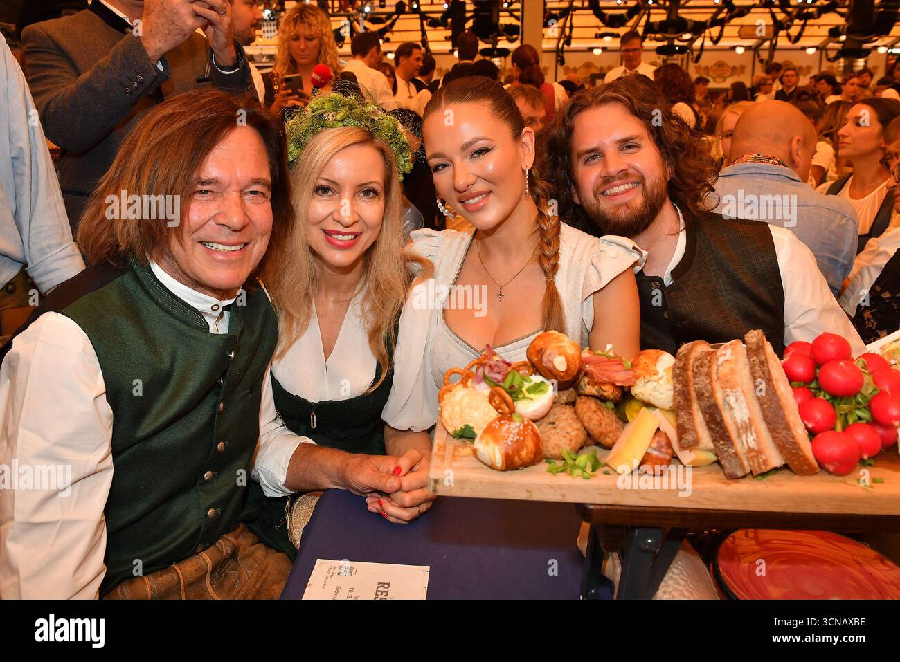 Juergen Drews, Ramona Drews, Joelina Drews and Adrian Louis pose during ...