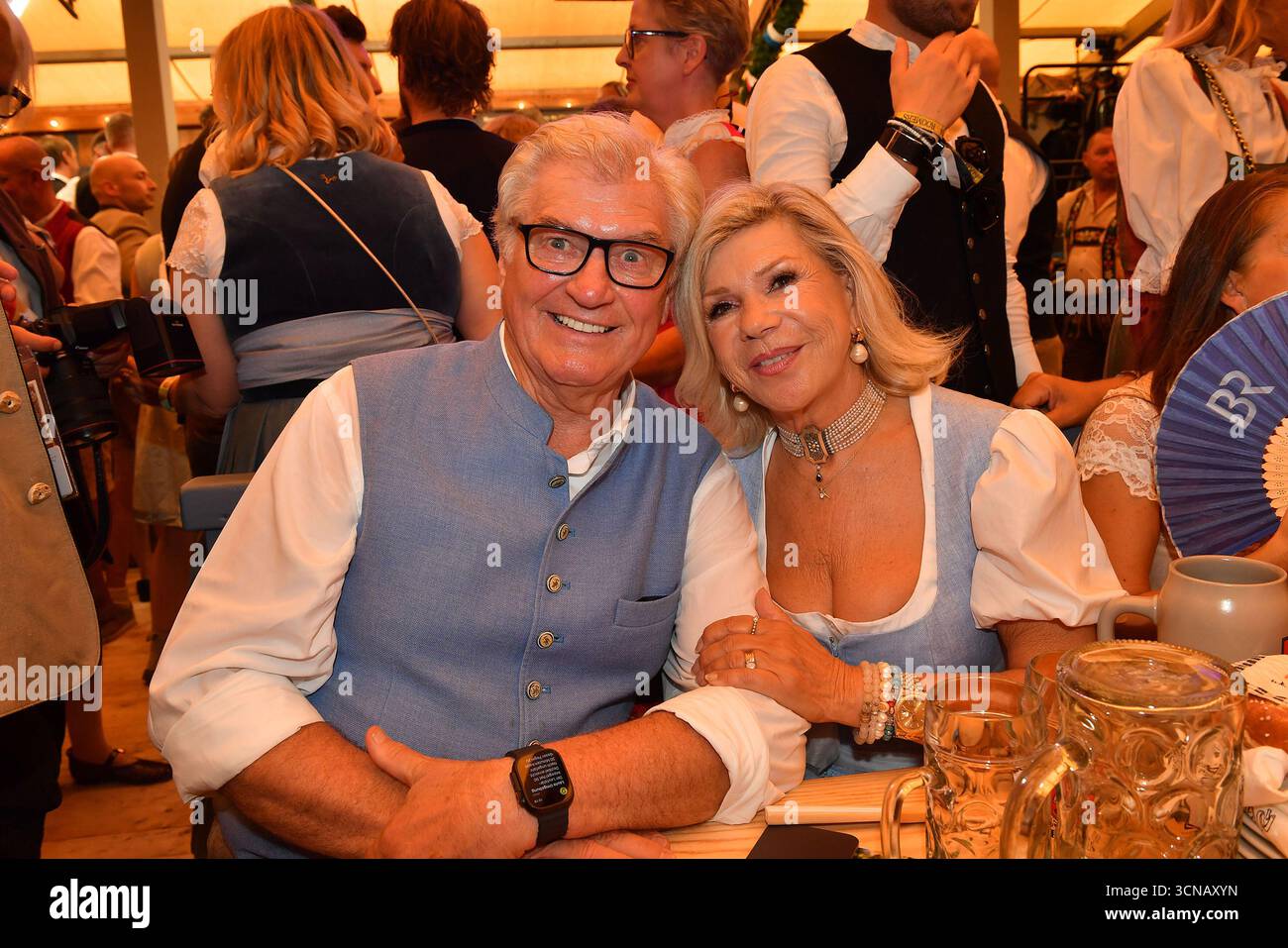 Michael Hartl and Marianne Hartl pose during the opening of the ...