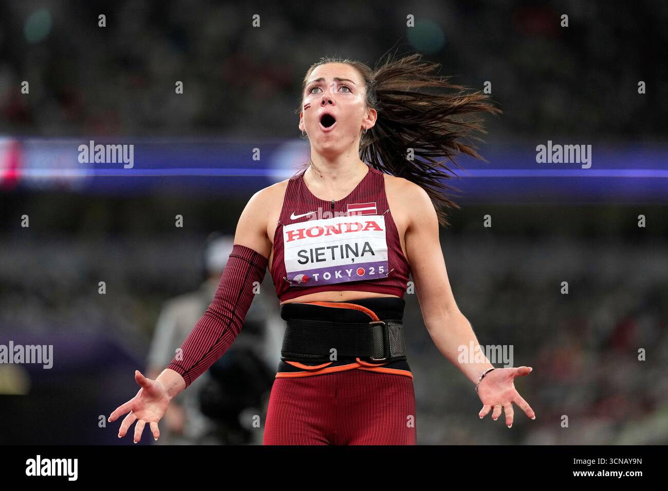 Latvia's Anete Sietina reacts after an attempt in the women's javelin ...