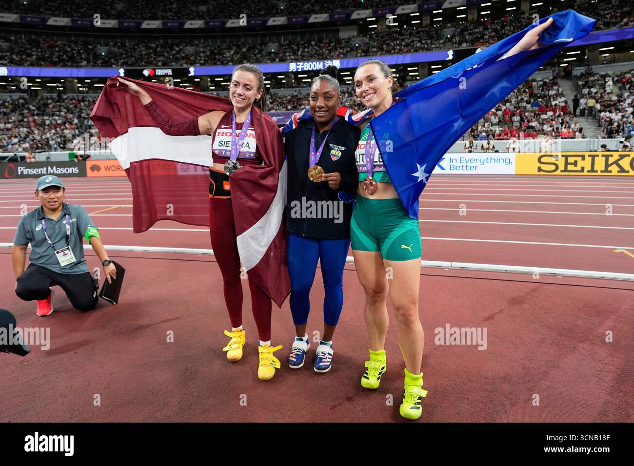 Gold medalist Ecuador's Juleisy Angulo, centre, stands with silver ...