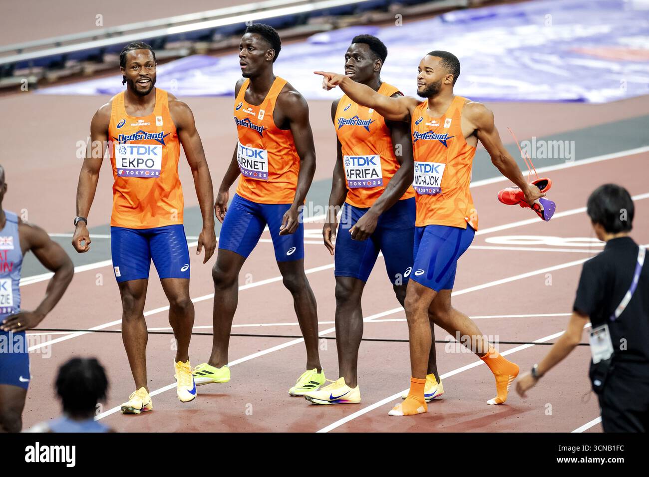 TOKYO – Nsikak Ekpo, Taymir Burnet, Elvis Afrifa, and Xavi Mo-Ajok compete in the 4x100-meter ...
