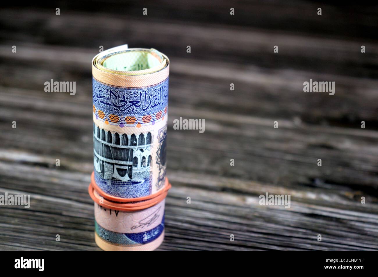 500 SAR five hundred Saudi riyals cash money banknote bills roll ...