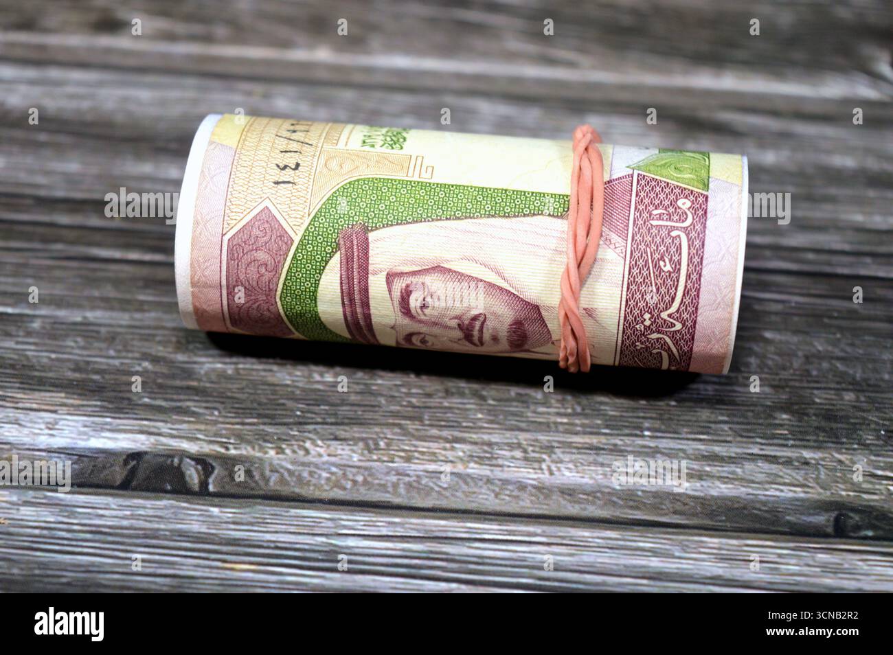 100 SAR one hundred Saudi Arabian riyals cash money banknote bills roll ...