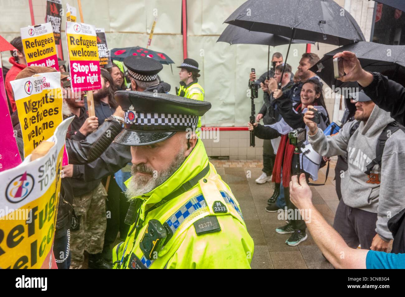 Stand up to Racism clash with police and streamers in Altrincham. A ...