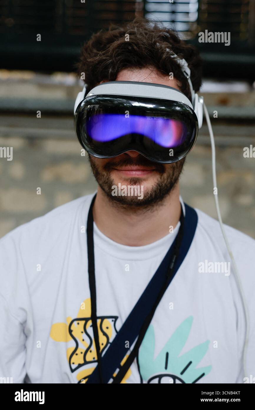 A photographer trying an Apple Vision Pro headset for an exclusive 180 ...