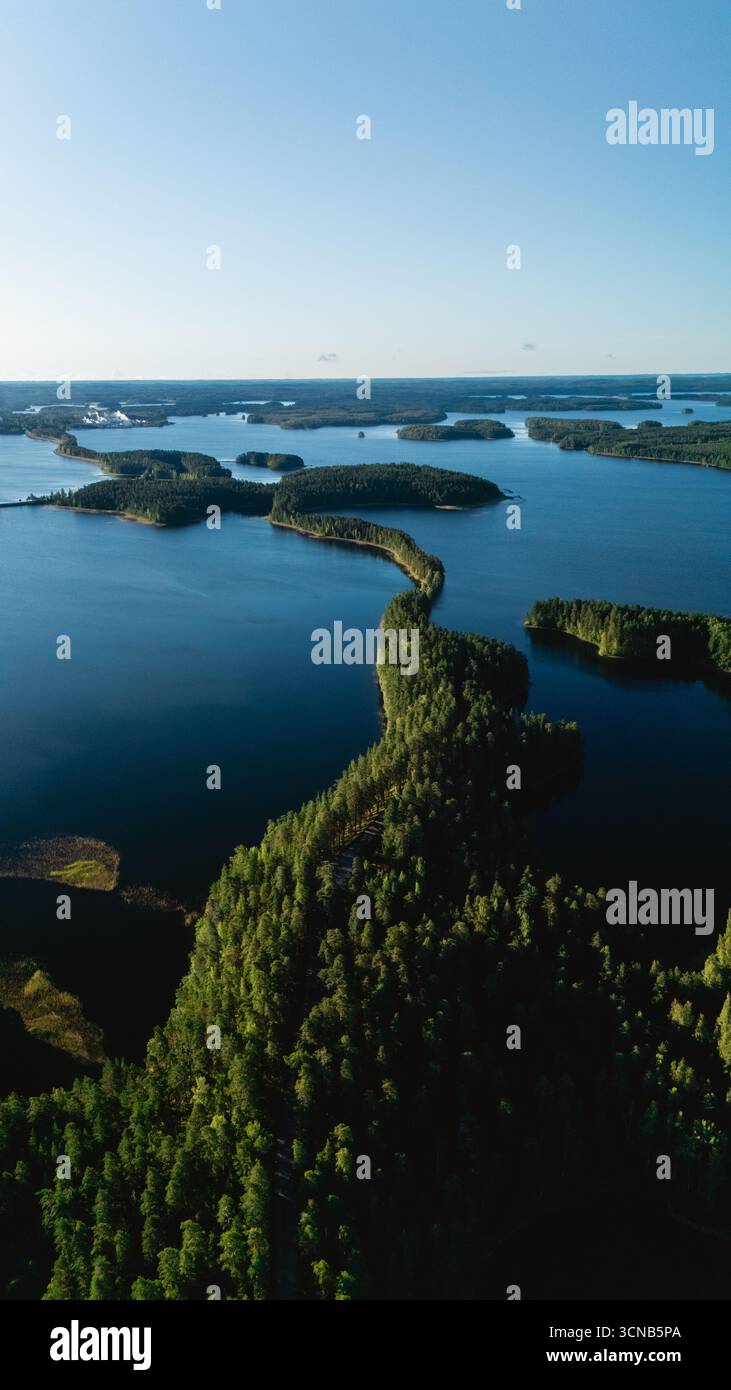 Discover the stunning landscape of Punkaharju, Finland, featuring lush ...